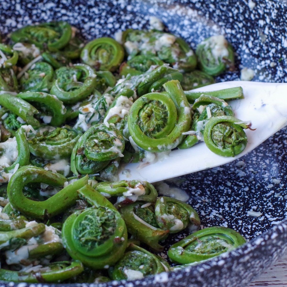 Cheesy Sautéed Fiddleheads - Food Meanderings
